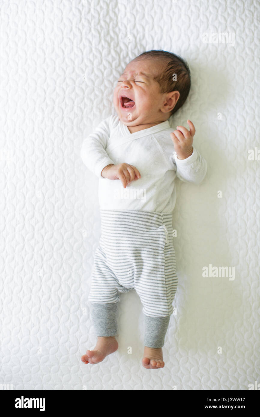 Child crying bed hi-res stock photography and images - Alamy