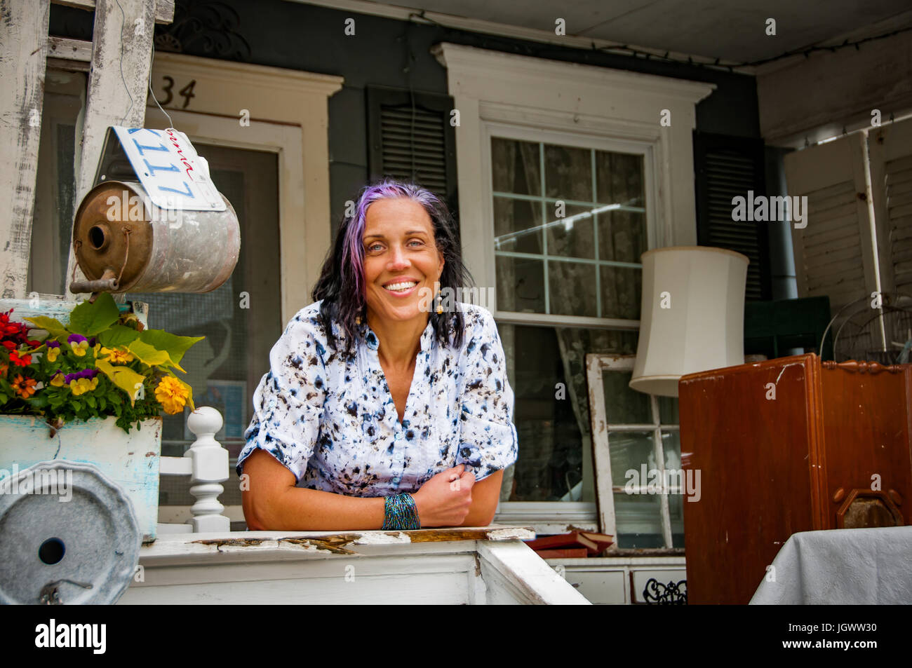 Portrait of female shop keeper in front porch shabby chic shop Stock ...