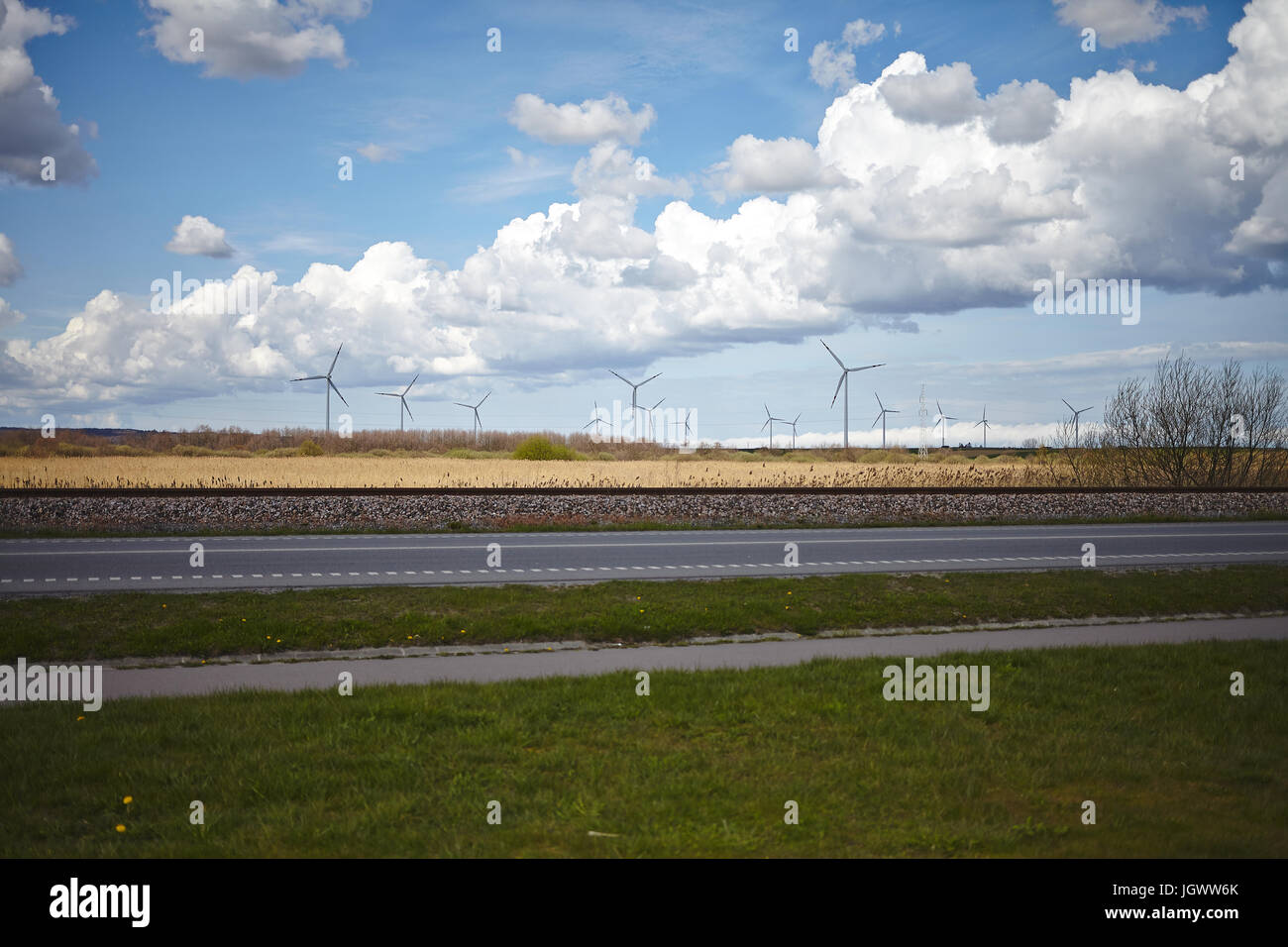 Farmland, road, railroad tracks and wind farm landscape in northern ...