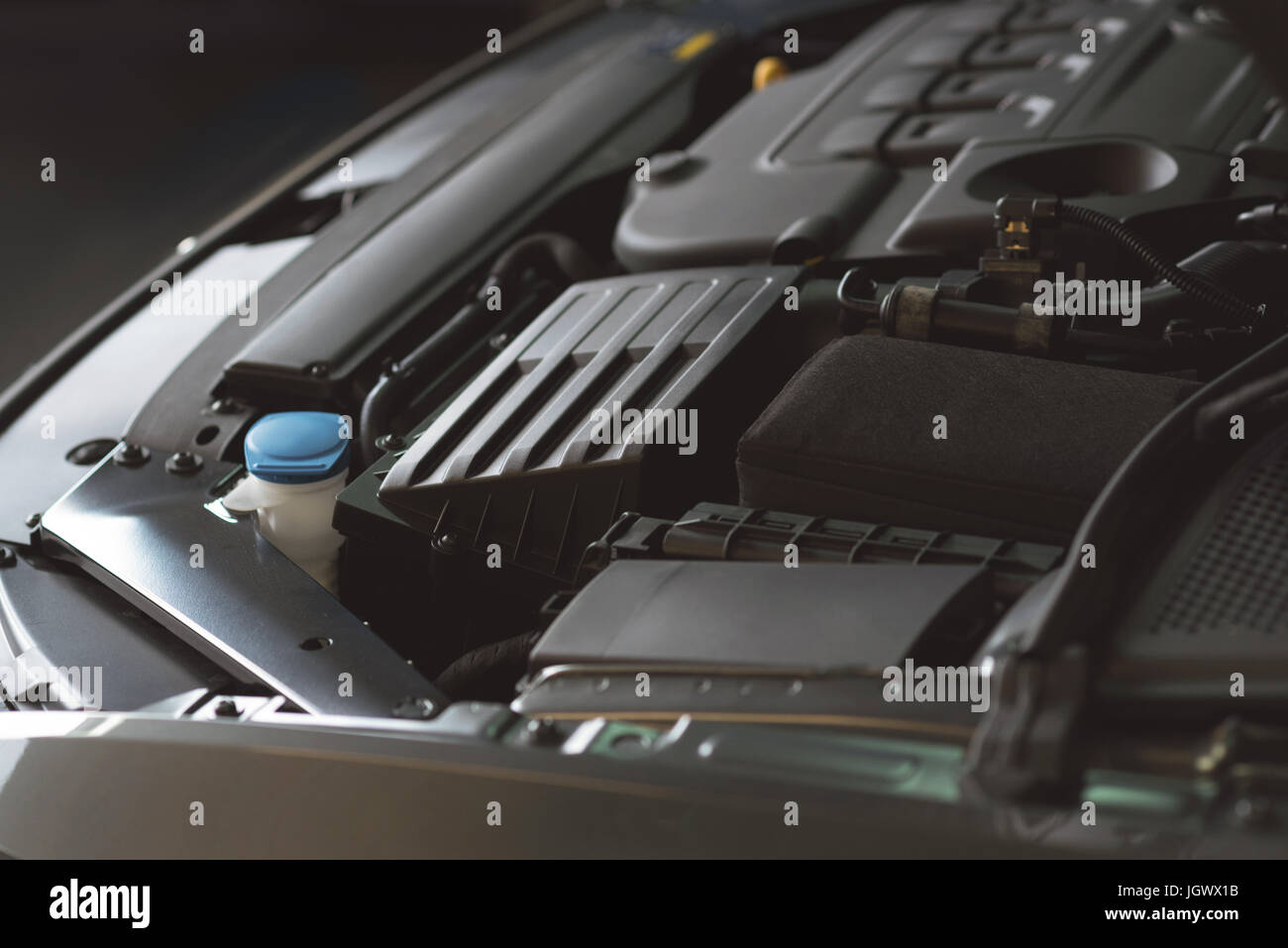 Brand new equipment. Cars front bonnet being opened before running a ...