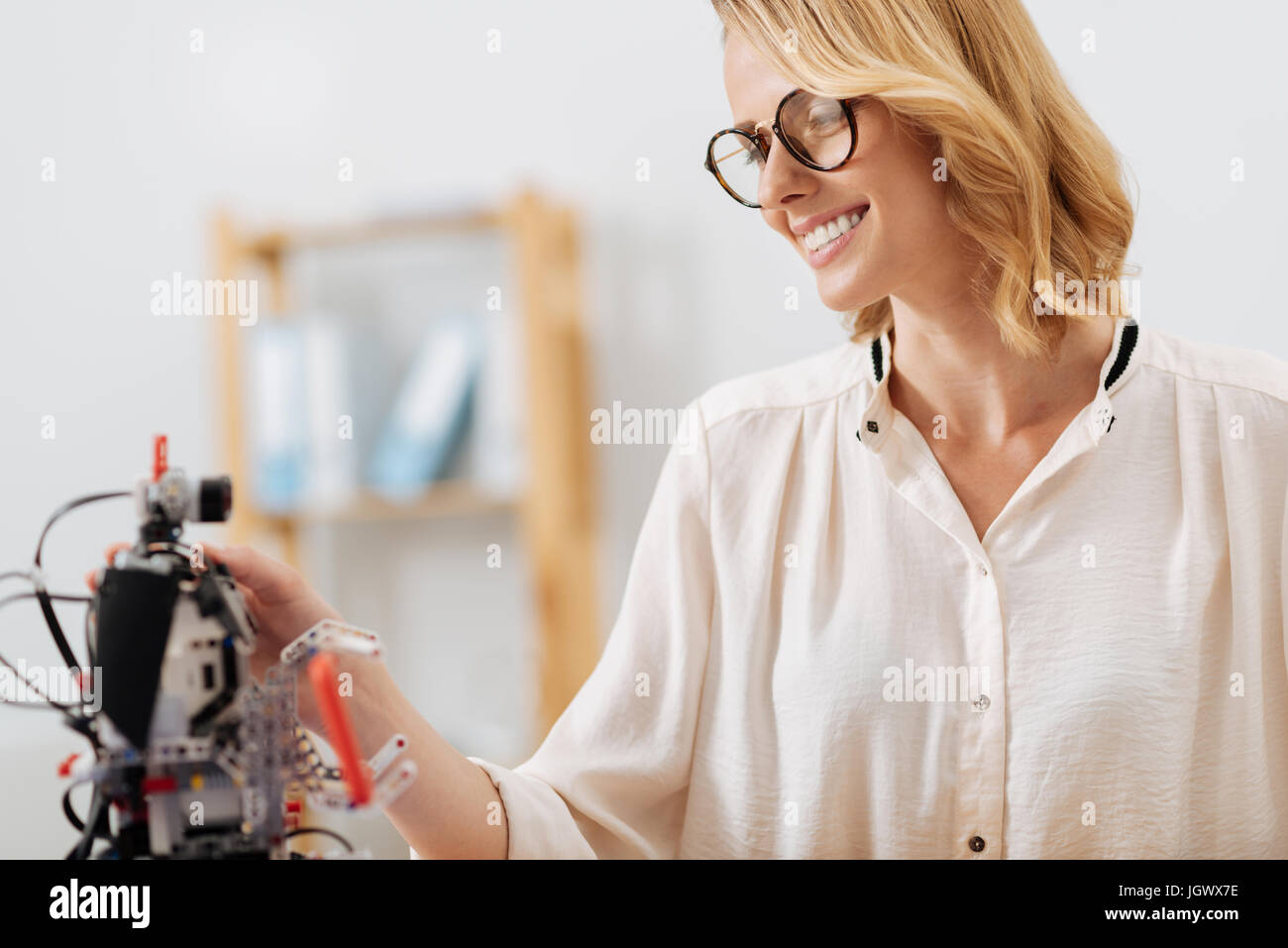 Modeling last functions. Smart experienced delightful engineer working in the lab while ...