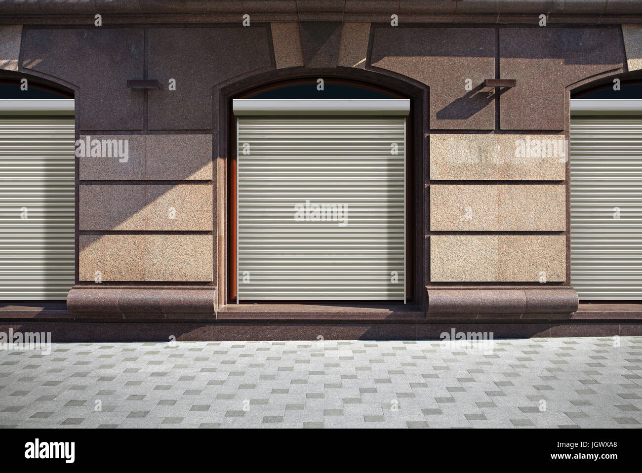 closed shutters on show window of shop Stock Photo - Alamy