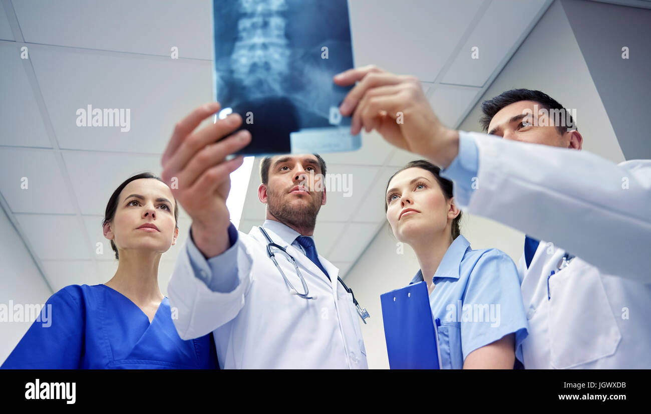 group of doctors looking at x-ray scan image Stock Photo - Alamy