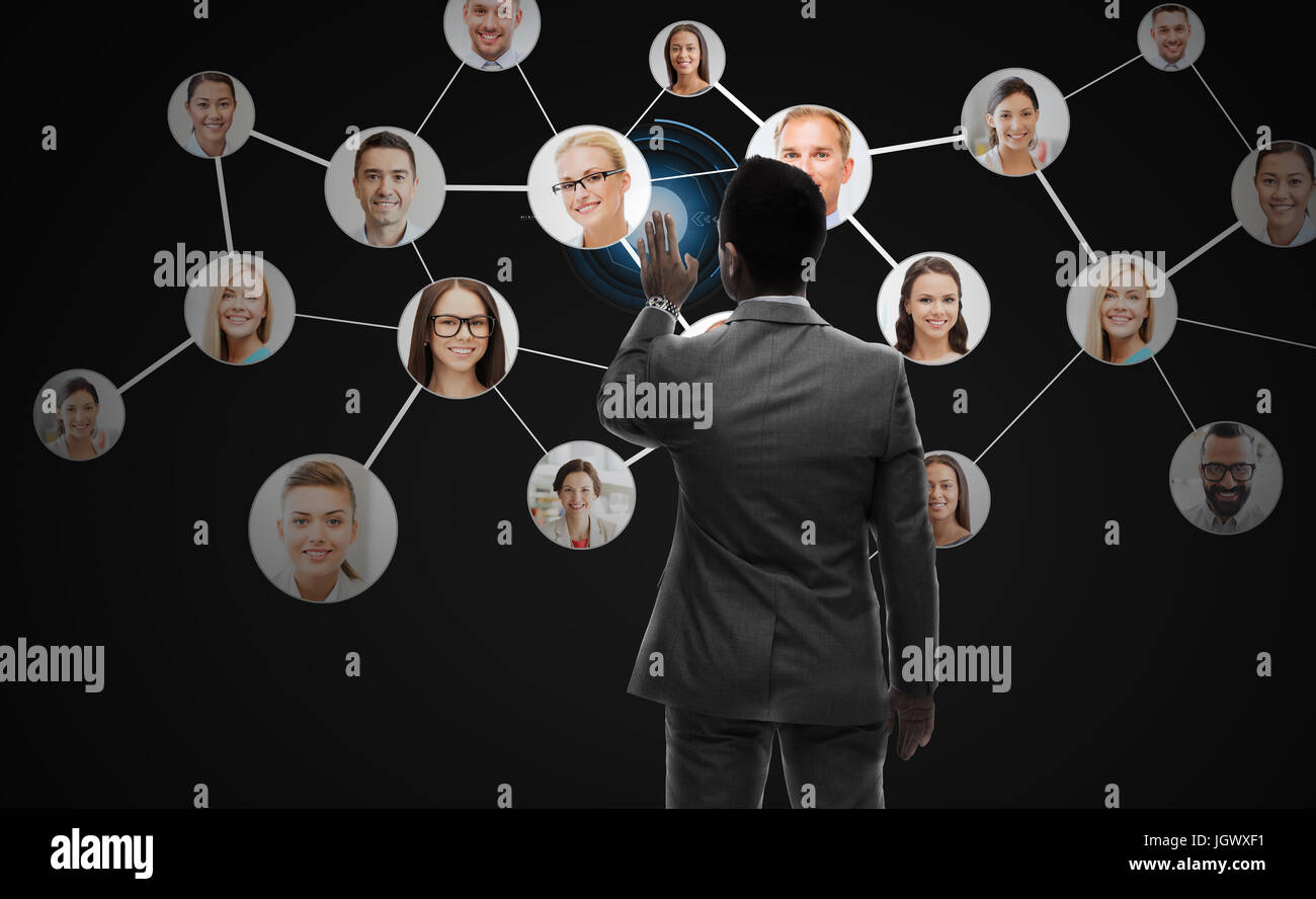 businessman working with network contacts icons Stock Photo - Alamy