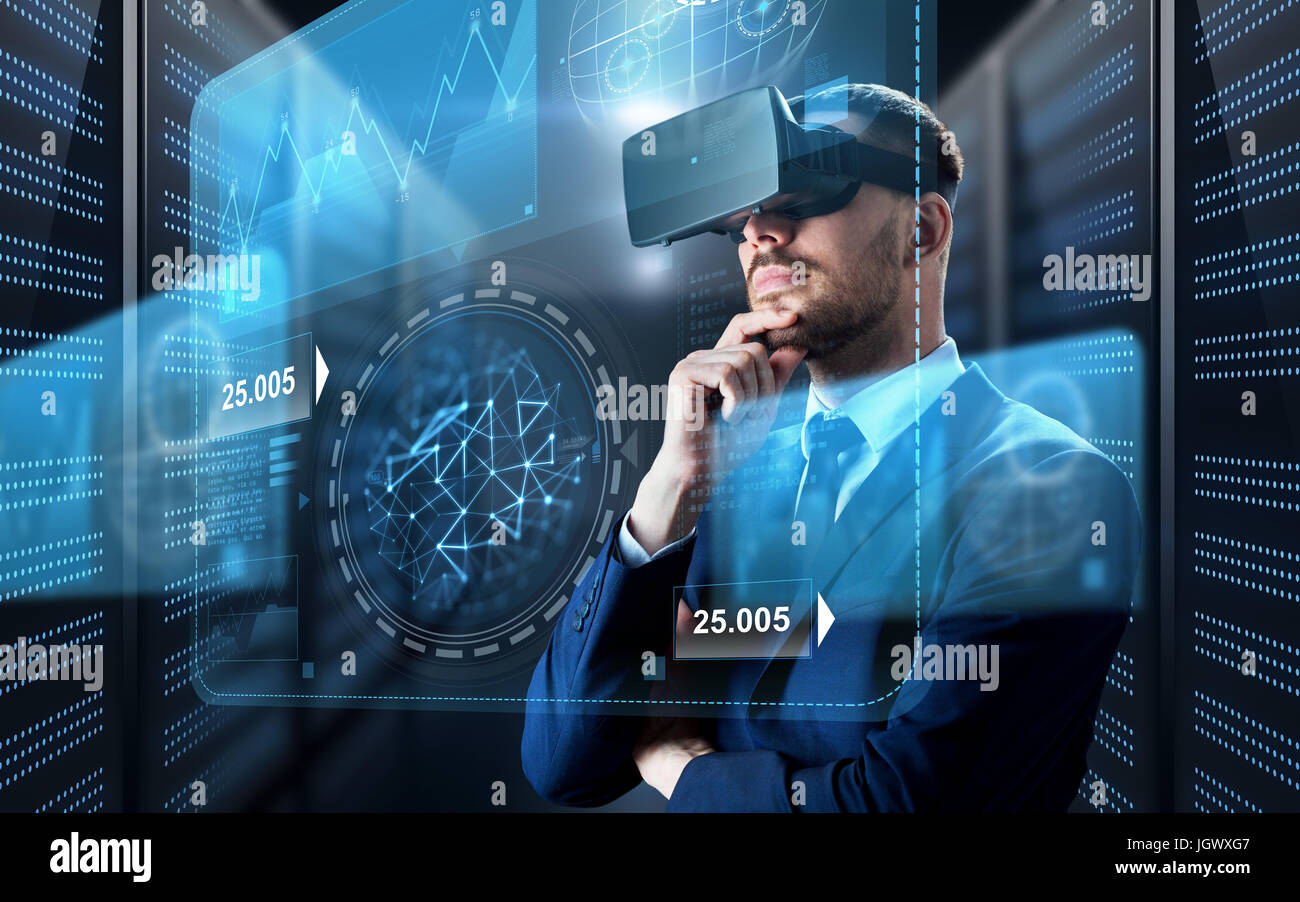 businessman in virtual reality headset with charts Stock Photo - Alamy