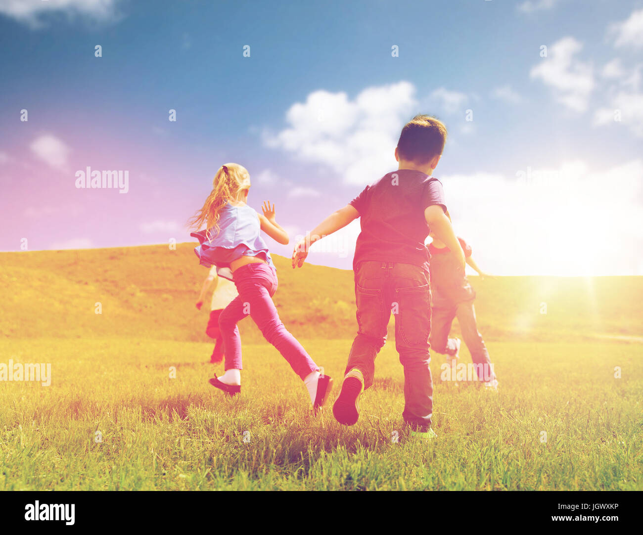 group of happy kids running outdoors Stock Photo - Alamy group of happy kids running outdoors Stock Photo - Alamy