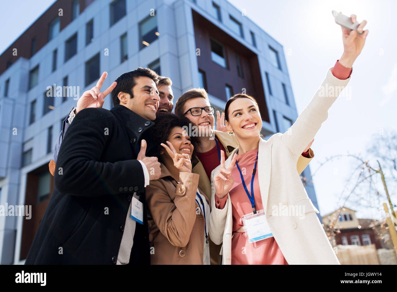 Happy people conference badges hi-res stock photography and images - Alamy