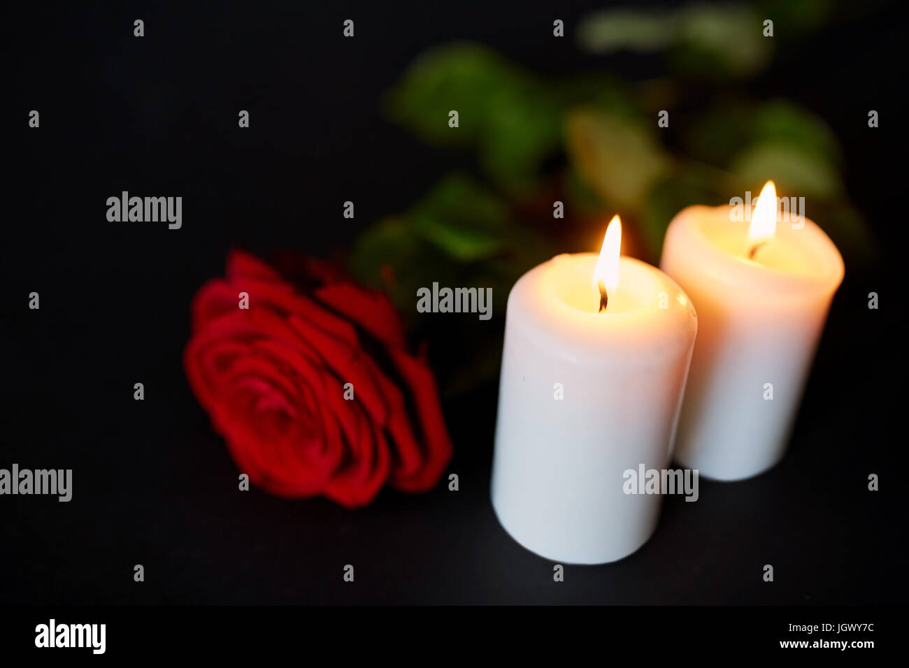 Flower and funeral candles hi-res stock photography and images - Alamy