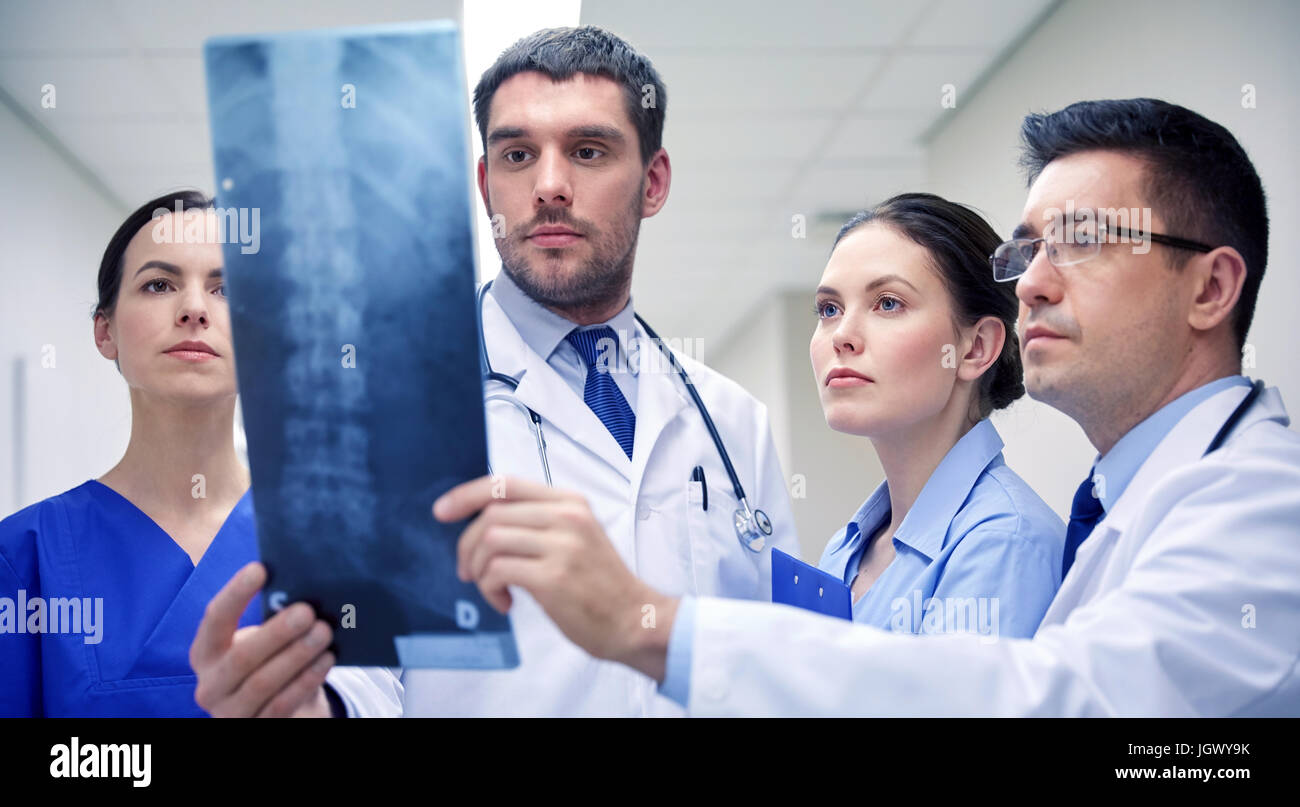 group of doctors looking at x-ray scan image Stock Photo - Alamy
