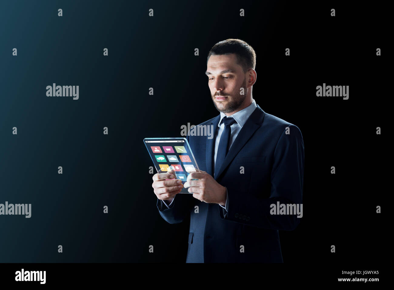 businessman working with transparent tablet pc Stock Photo - Alamy