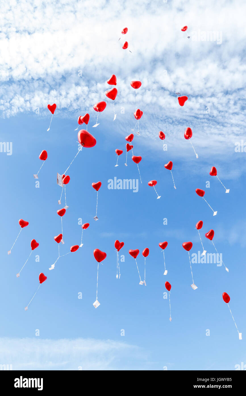 Wedding day - Heart shaped red balloons Stock Photo - Alamy