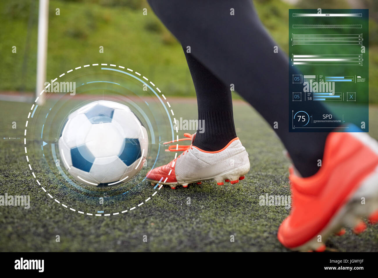 soccer player playing with ball on football field Stock Photo - Alamy