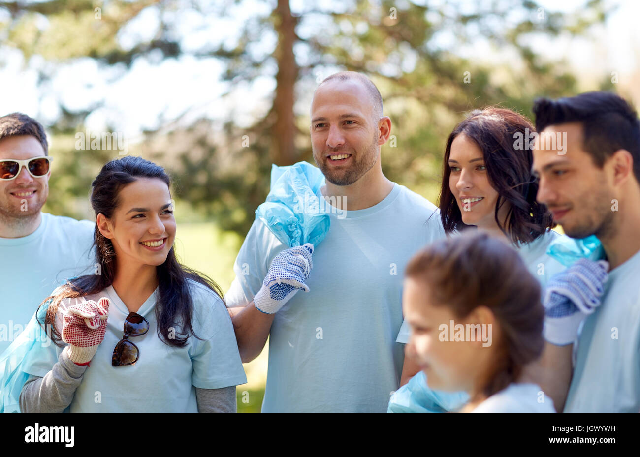volunteers with garbage bags walking outdoors Stock Photo - Alamy