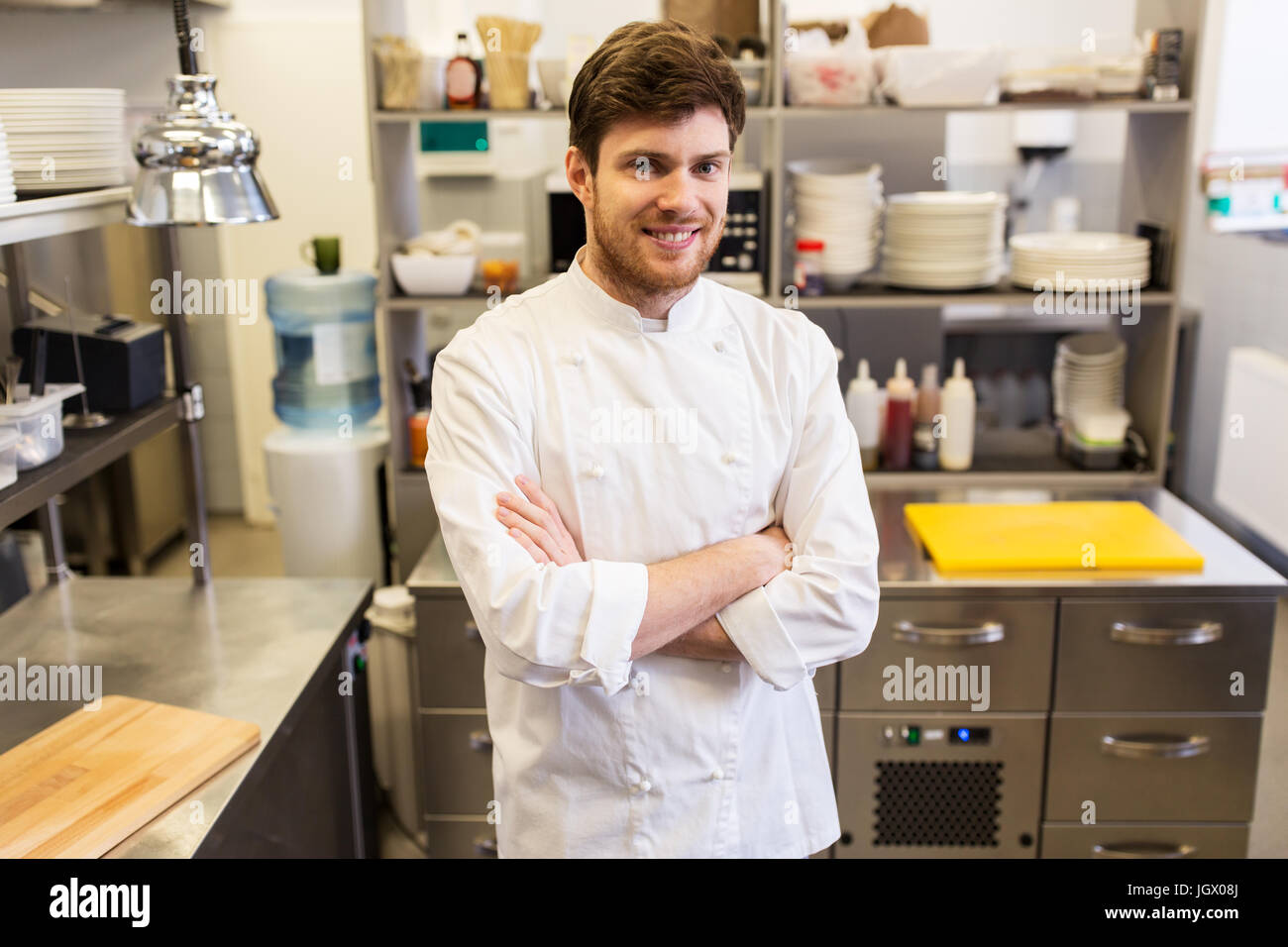 happy male chef cook at restaurant kitchen Stock Photo - Alamy