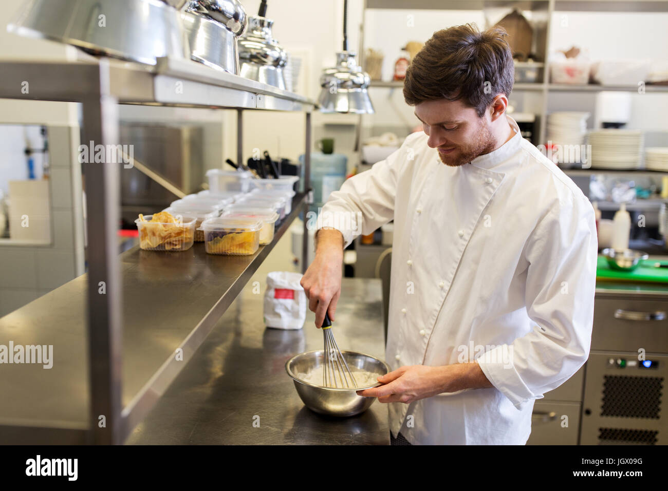 happy male chef cooking food at restaurant kitchen Stock Photo - Alamy