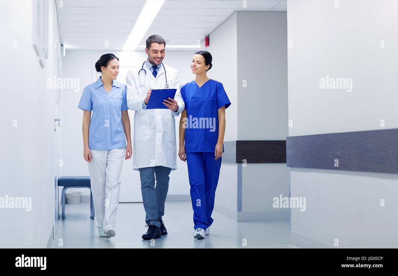 group of medics at hospital with clipboard Stock Photo - Alamy