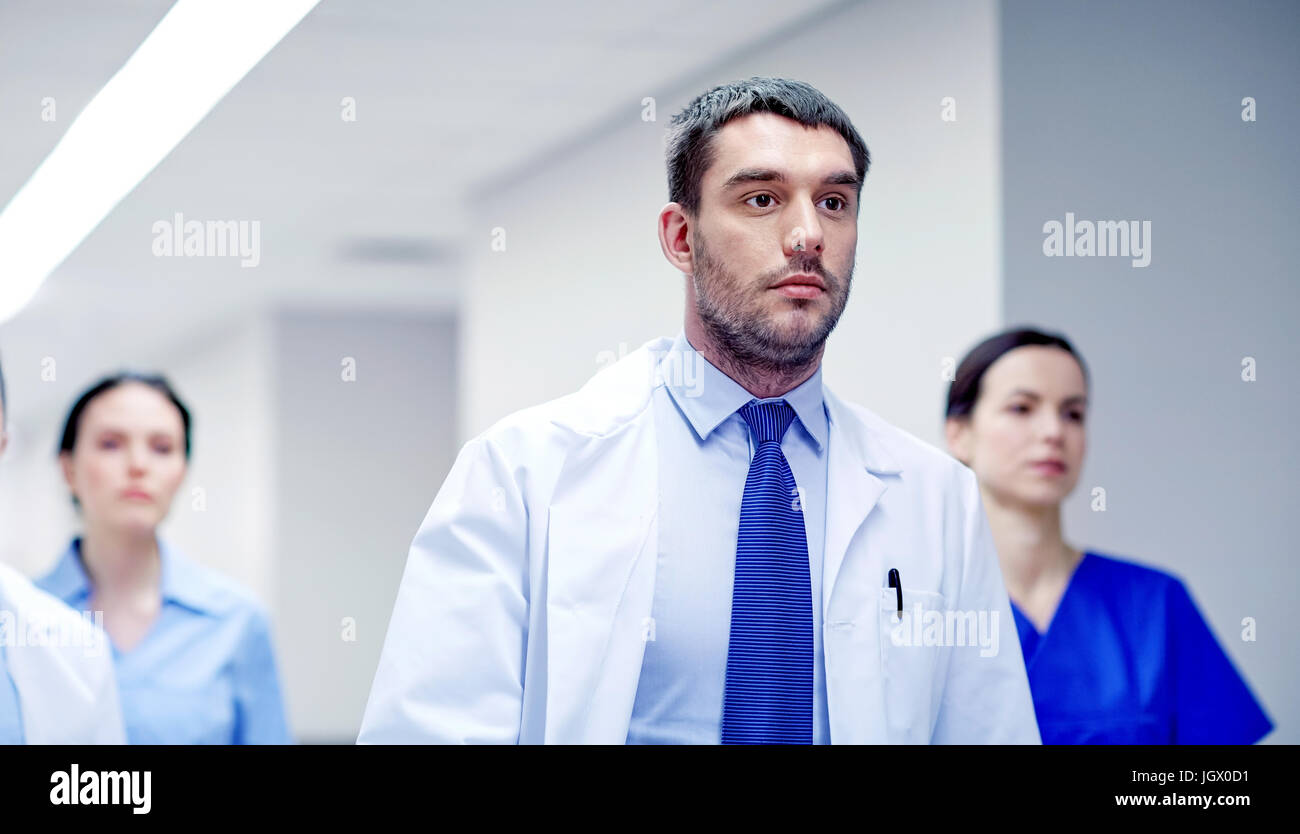 group of medics walking along hospital Stock Photo - Alamy
