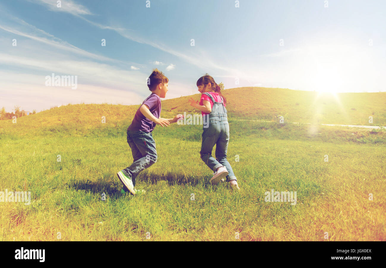 Kids running outdoors hi-res stock photography and images - Alamy