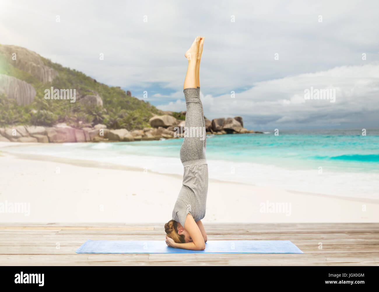 Headstand position hi-res stock photography and images - Alamy