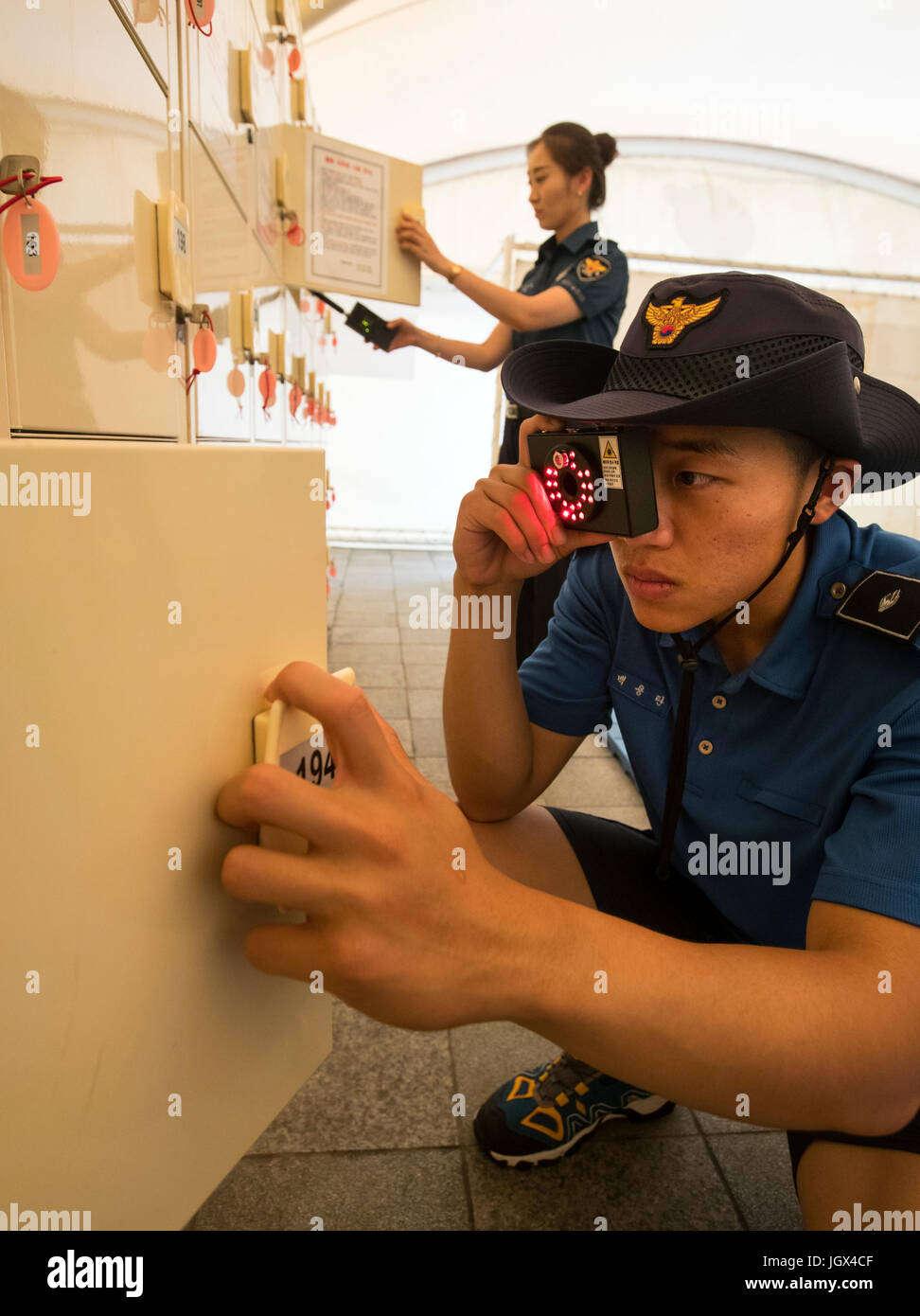 Zero tolerance toward privacy infringement A police officer uses a ...