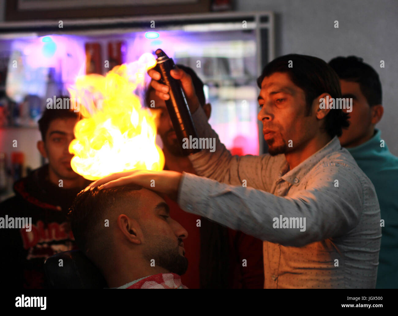 Palestinian barber fire hi-res stock photography and images - Alamy