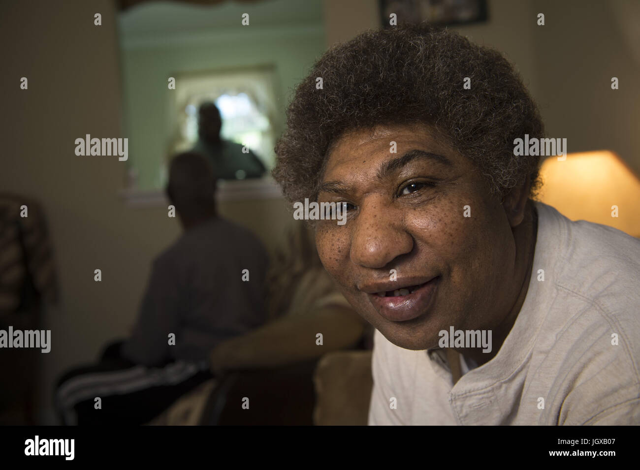 Athens, GA, USA. 23rd Jan, 2014. Perry Hendricks at the duplex home where he lives, supported by ...