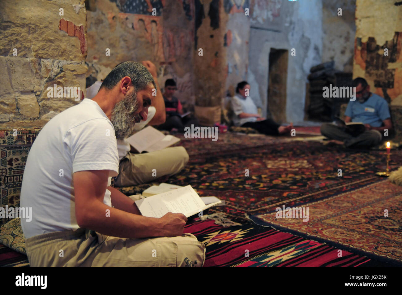The monk Budrus prays with his brothers and nuns inside the monastery ...
