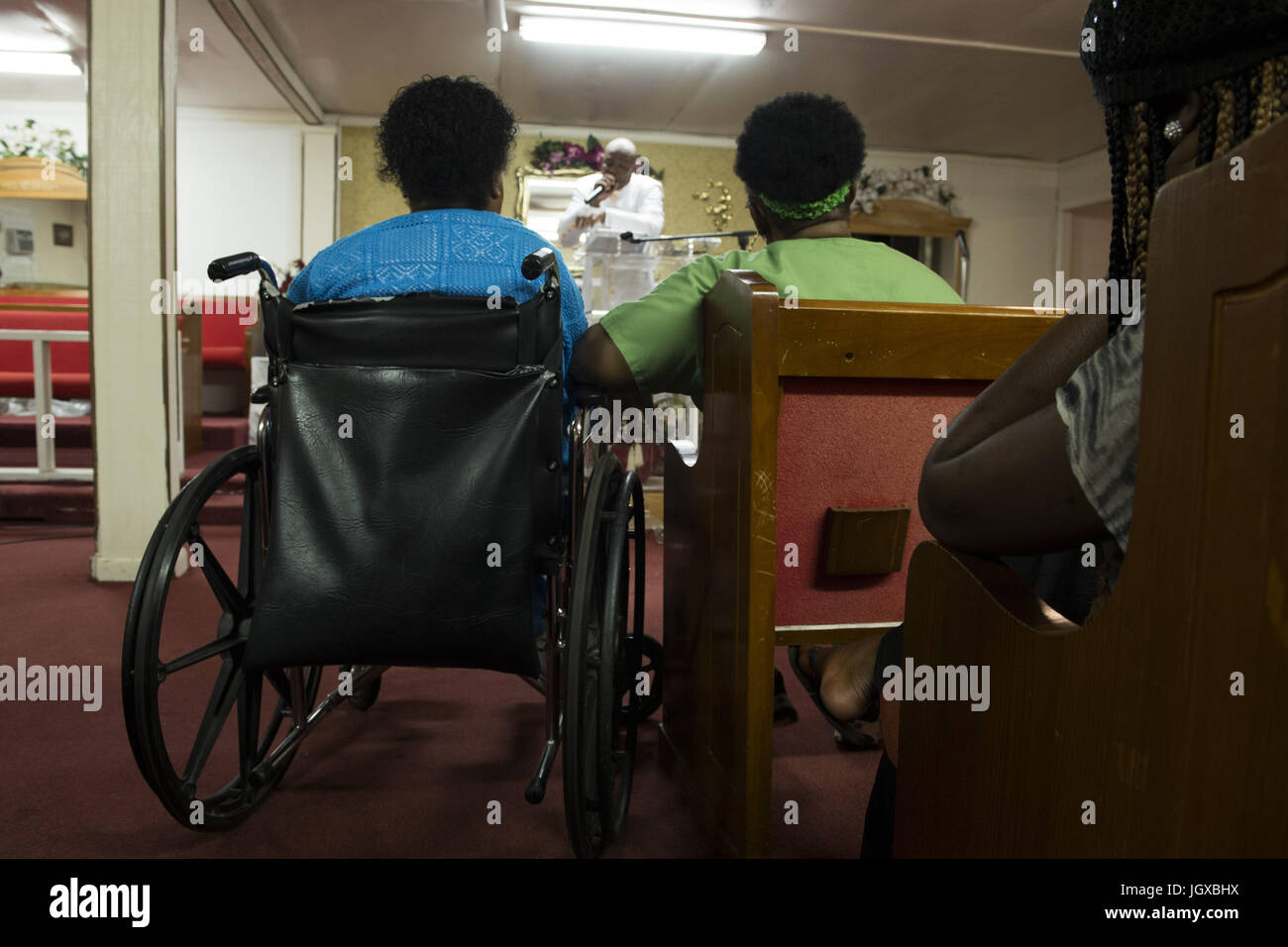 Waycross, GA, USA. 3rd Aug, 2014. Helen Lotson listens to sermon at at ...