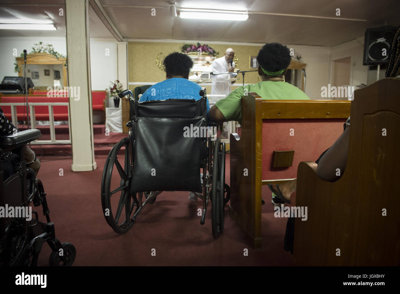 Waycross, GA, USA. 3rd Aug, 2014. Helen Lotson listens to sermon at at ...