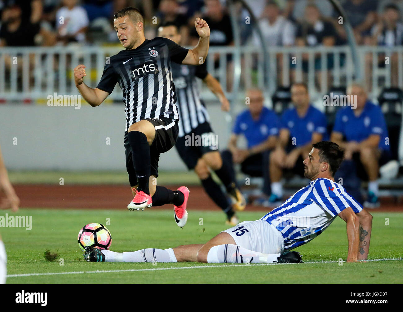 Belgrade. 12th July, 2017. Partizan's Nemanja Mihajlovic (L) vies with ...
