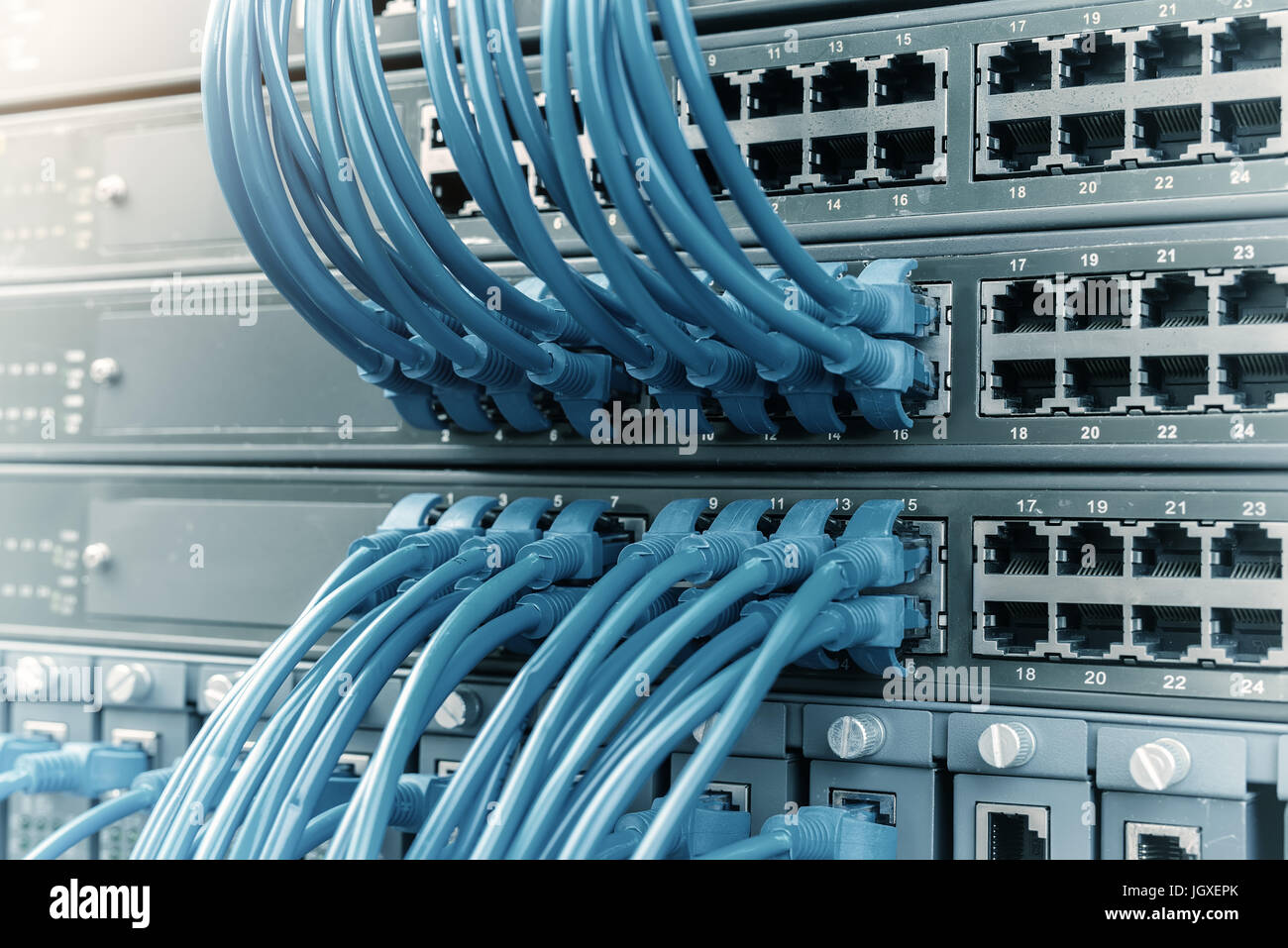 network cable connecting on network core switch close up Stock Photo ...