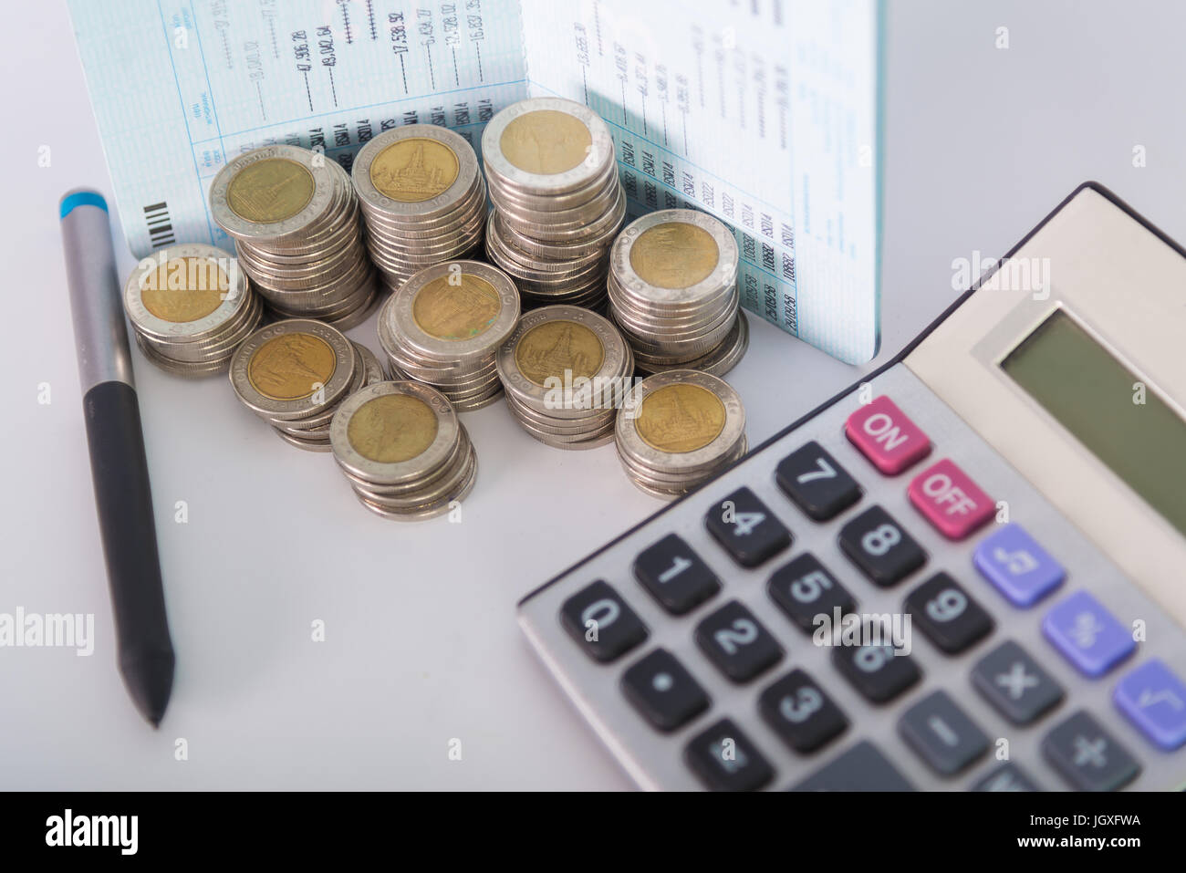 Savings, increasing columns of coins, piles of coins arranged as a ...