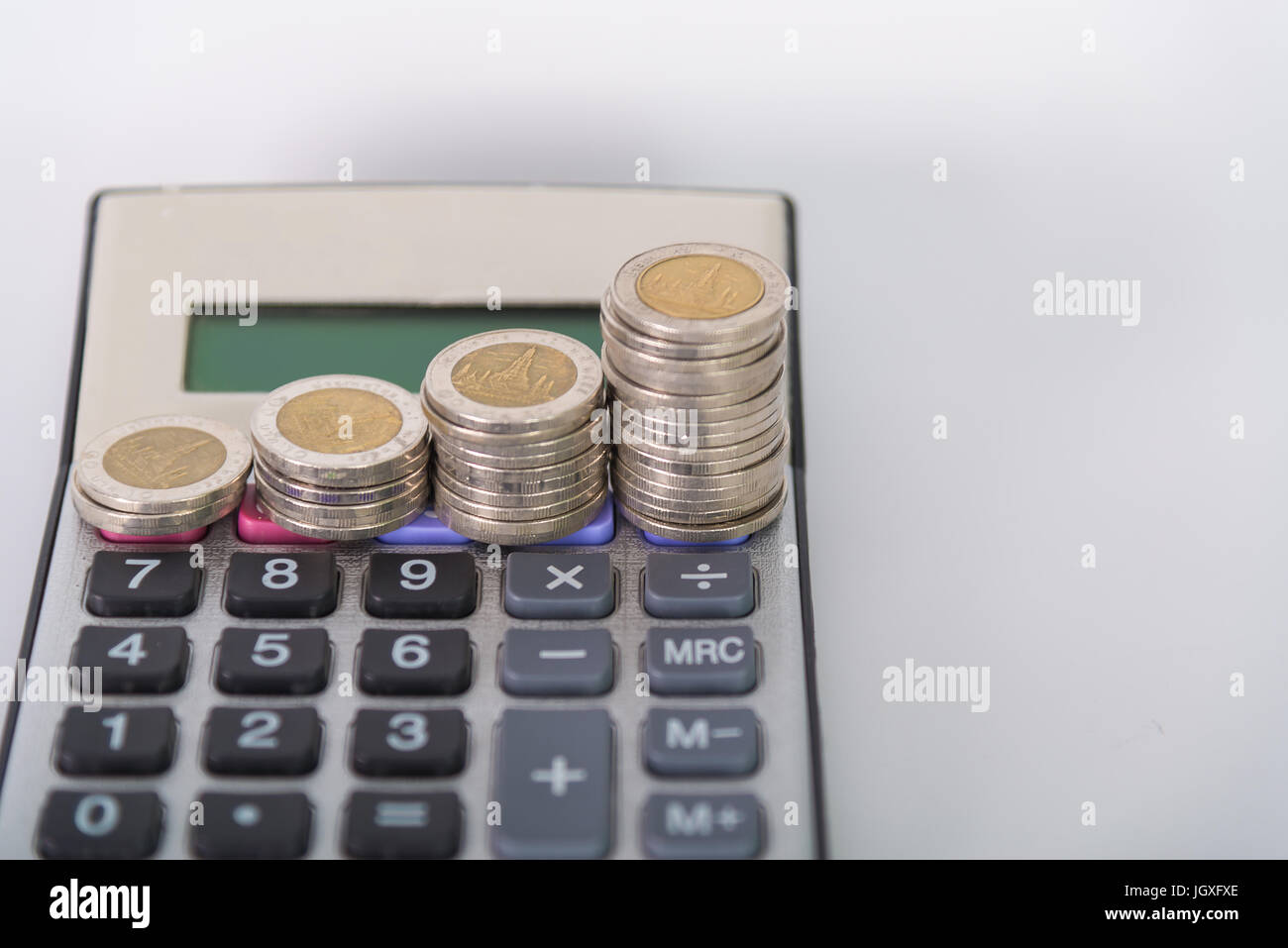 Savings, increasing columns of coins, piles of coins arranged as a ...