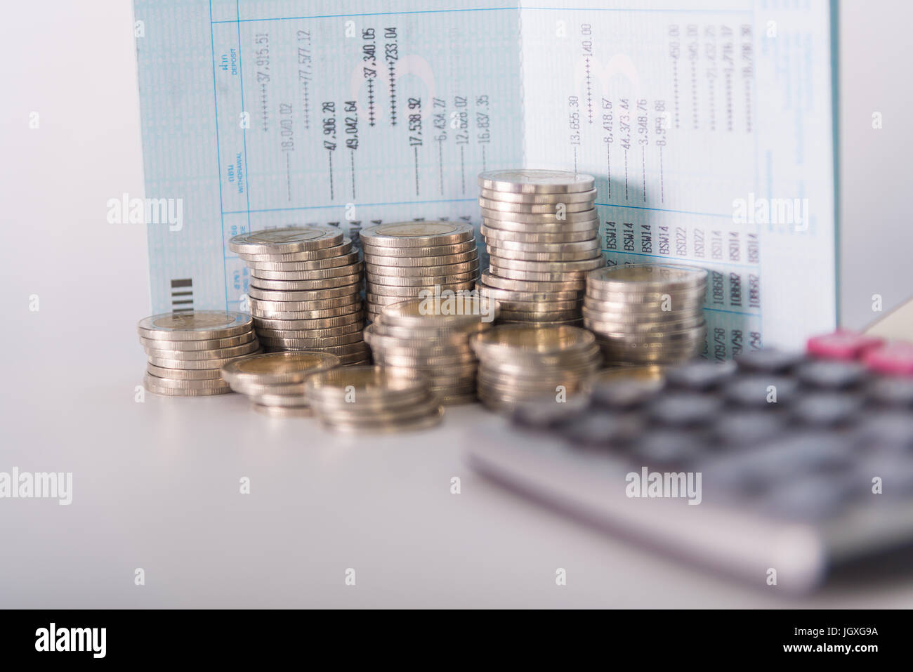 Savings, increasing columns of coins, piles of coins arranged as a ...