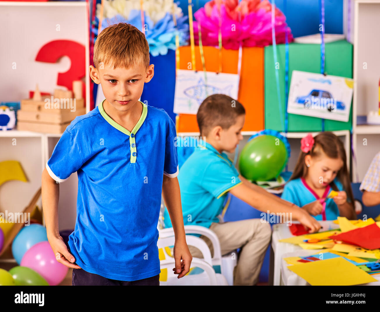 Small students boy painting in art school class Stock Photo - Alamy