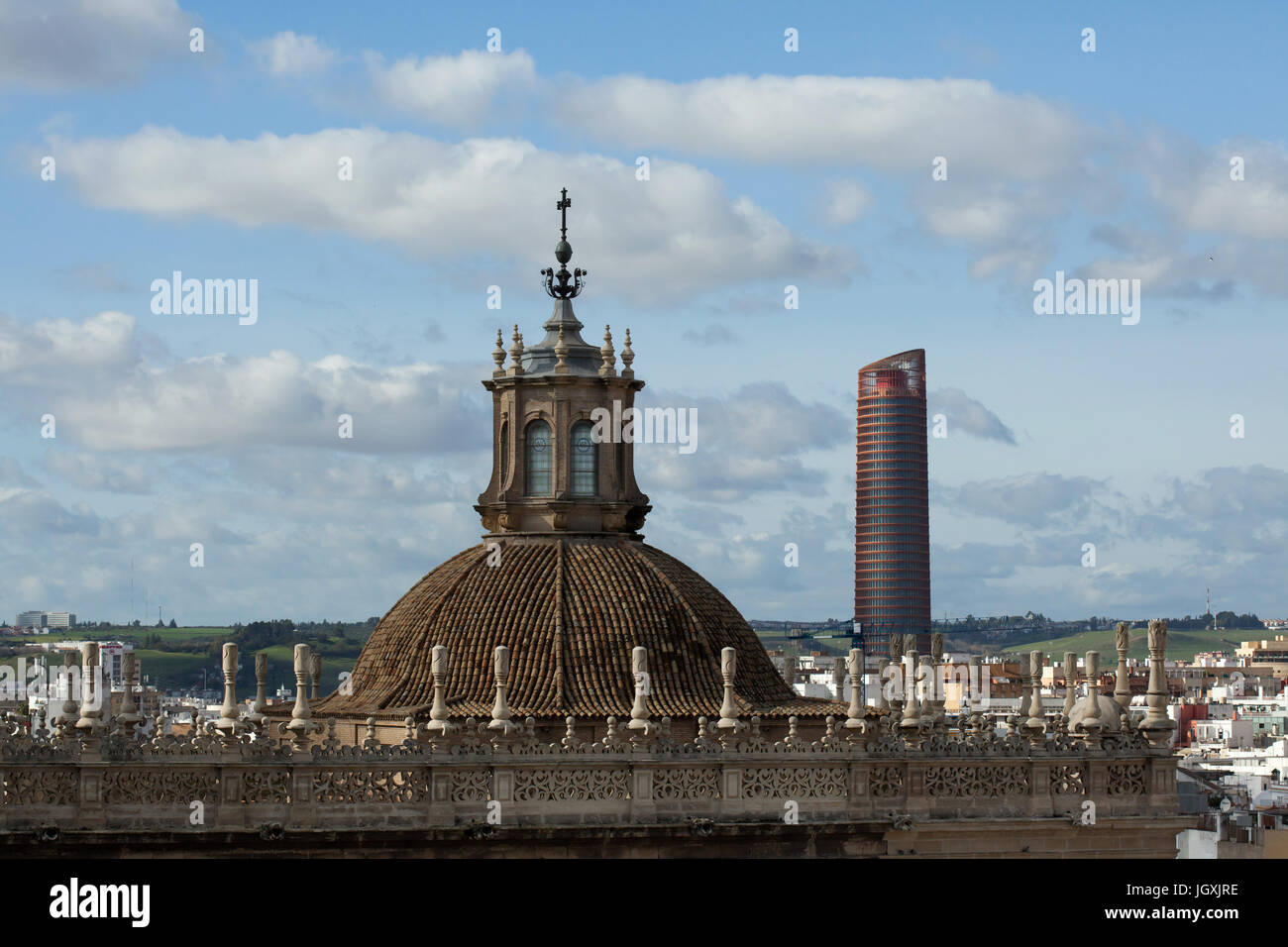 Sevilla Tower (Torre Sevilla) and the dome of the Cathedral Tabernacle (El Sagrario de la ...