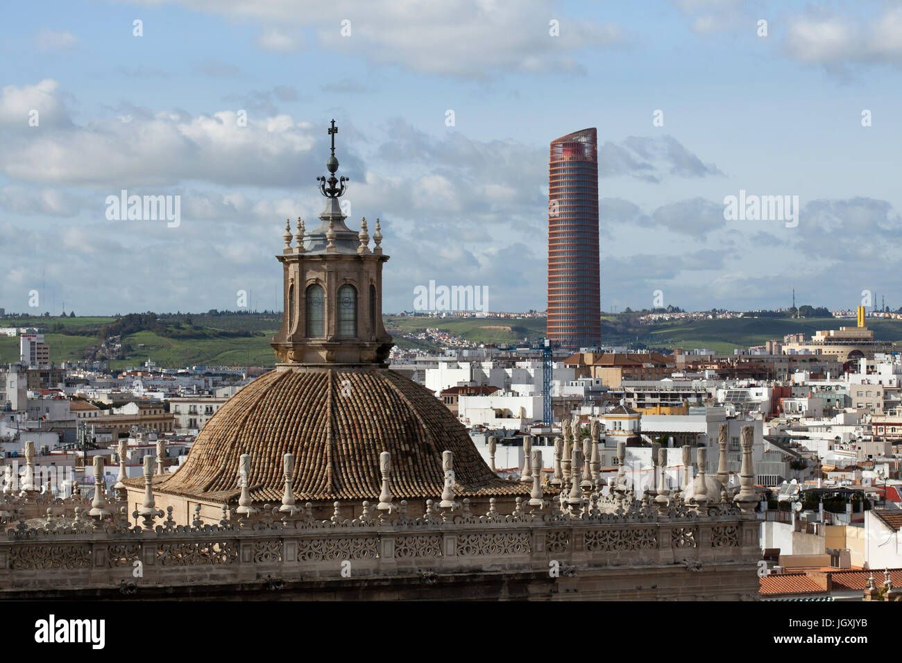 Sevilla Tower (Torre Sevilla) and the dome of the Cathedral Tabernacle ...