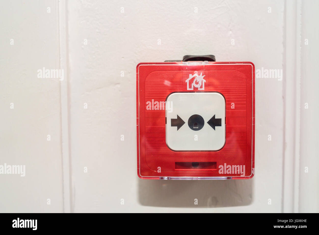 Close up of fire alarm switch in red box on wall Stock Photo - Alamy