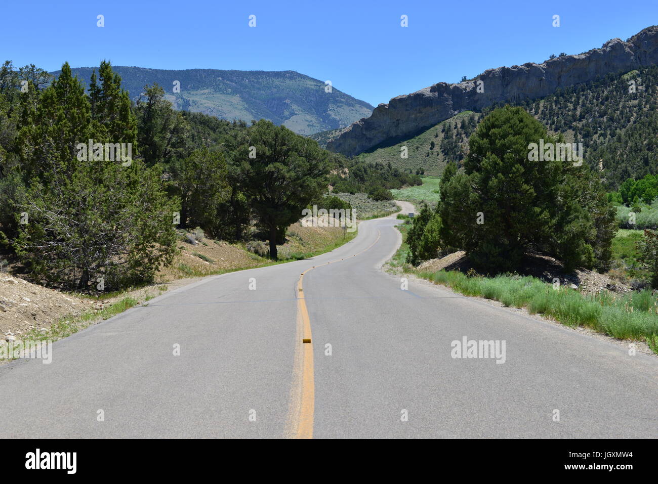 A winding road going through the scenery of Cave Lake state park Stock ...