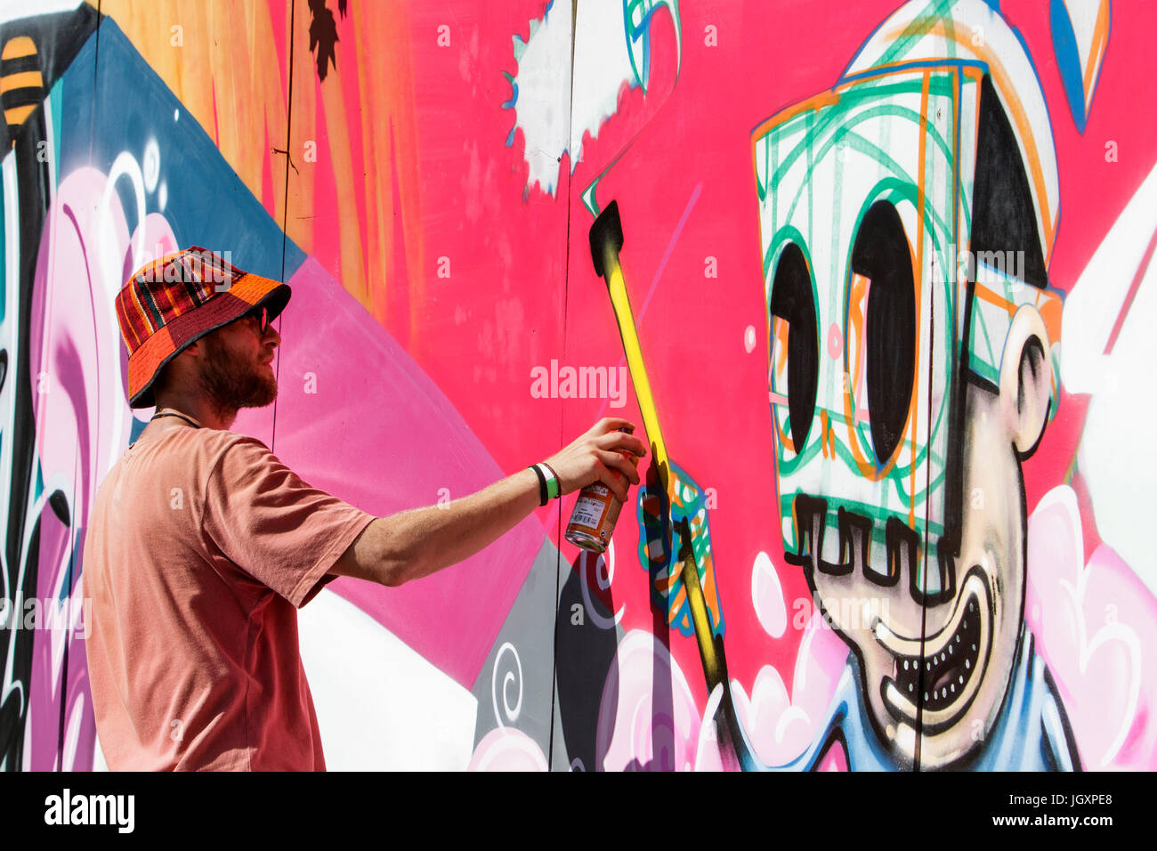An artist is pictured working at the Upfest 2016 festival,Europe's ...