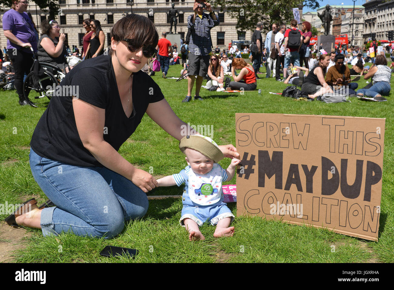 Supporters of Labour leader Jeremy Corbyn gather in Parliament Square ...