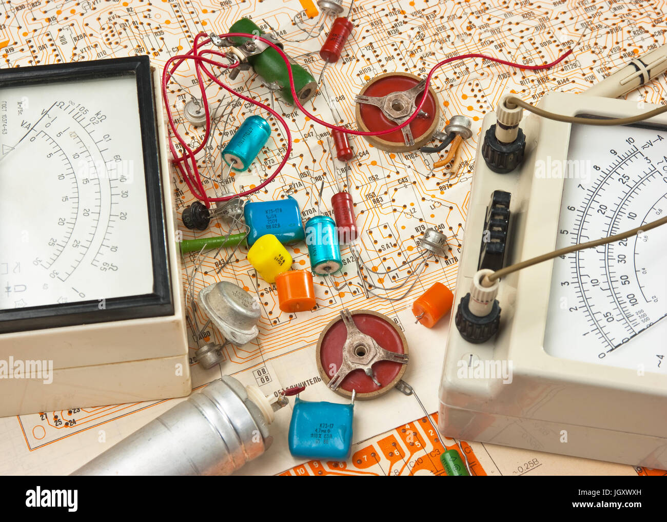 Old electronic components lie on the wiring diagram Stock Photo - Alamy