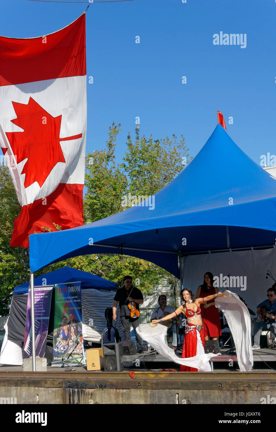 Romani dancer performing on an outdoor stage during Canada Day ...