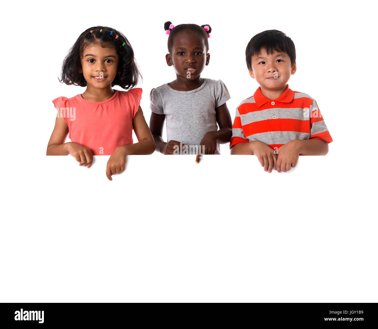 Group of multiracial kids portrait in studio with white board.Isolated ...