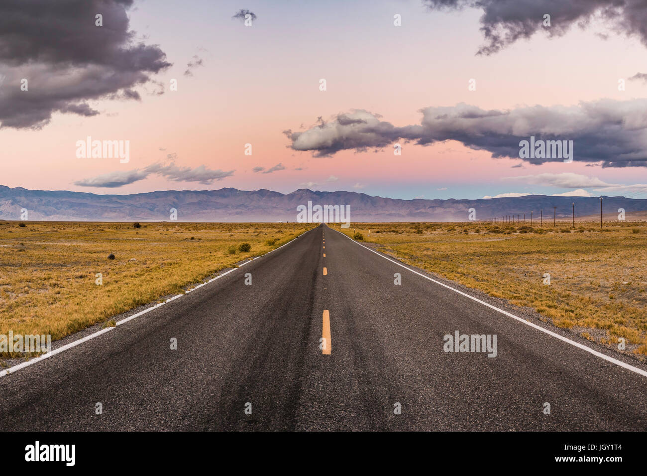 Straight road at sunset hi-res stock photography and images - Alamy