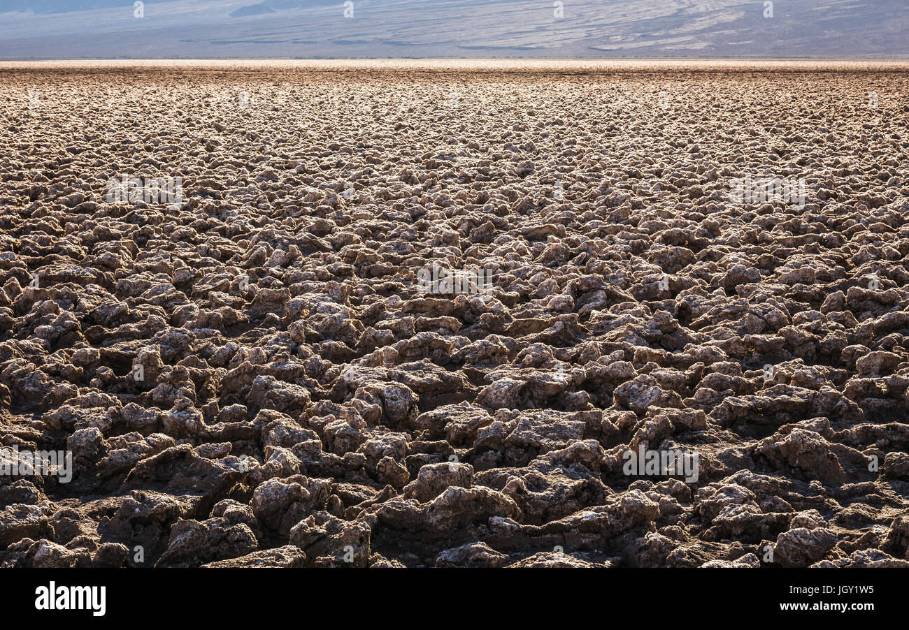 Flat dry mud landscape at Badwater Basin in Death Valley National Park ...