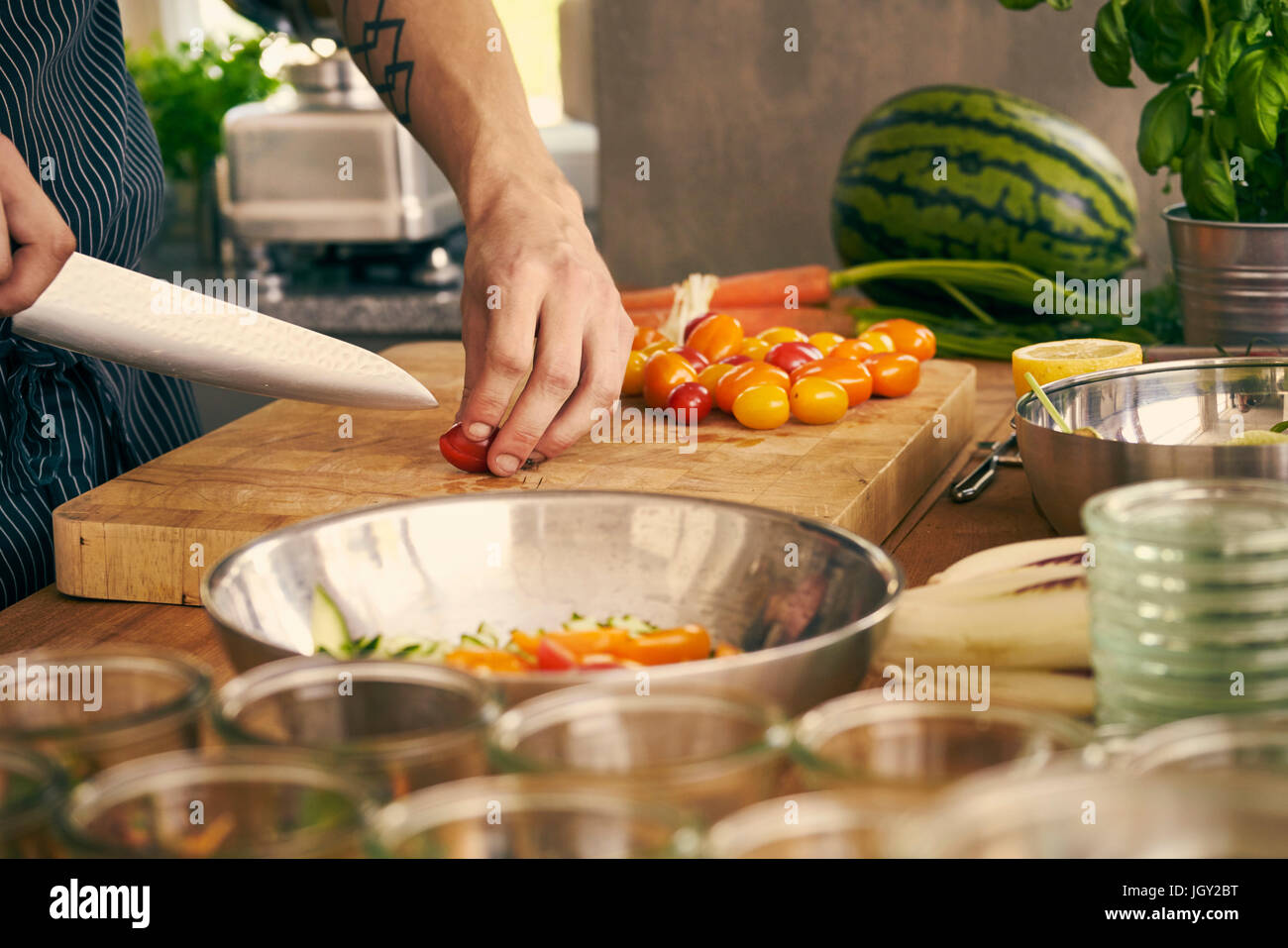 Cropped view of chef chopping vegetables Stock Photo - Alamy