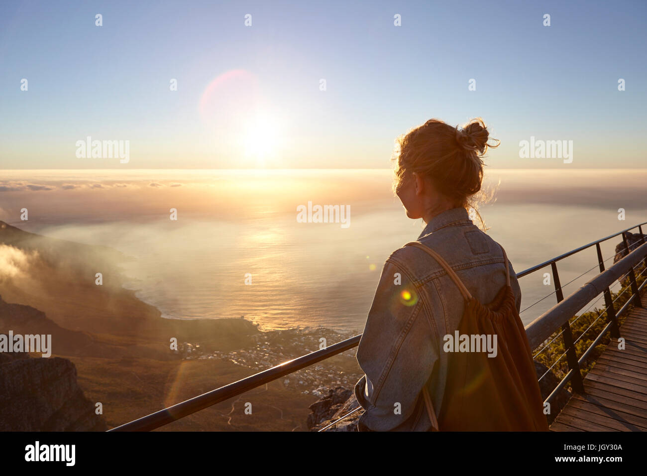 Young woman on top of Table Mountain, looking at view, Table Mountain ...