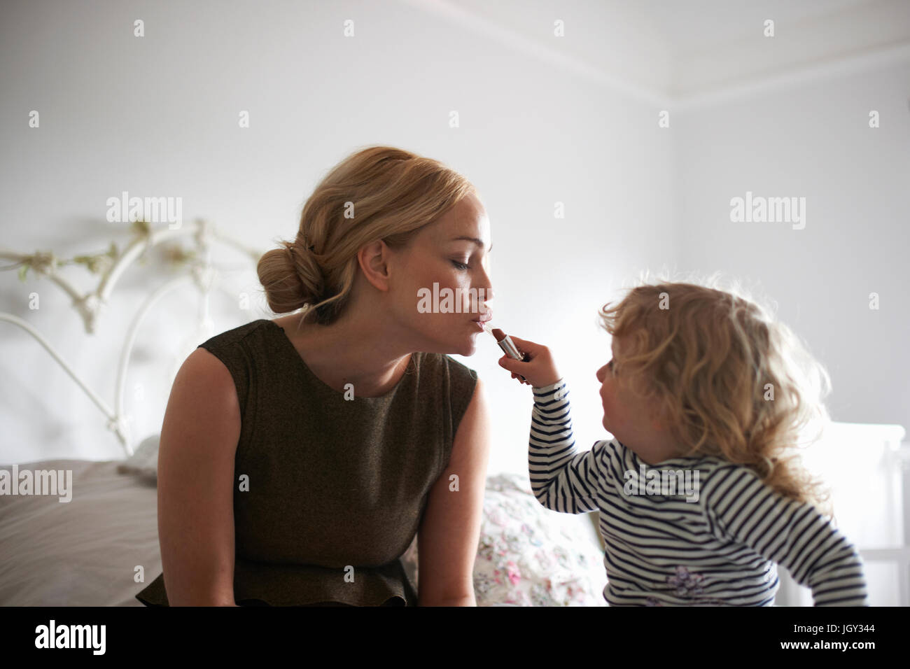 Mother lipstick child hi-res stock photography and images - Alamy