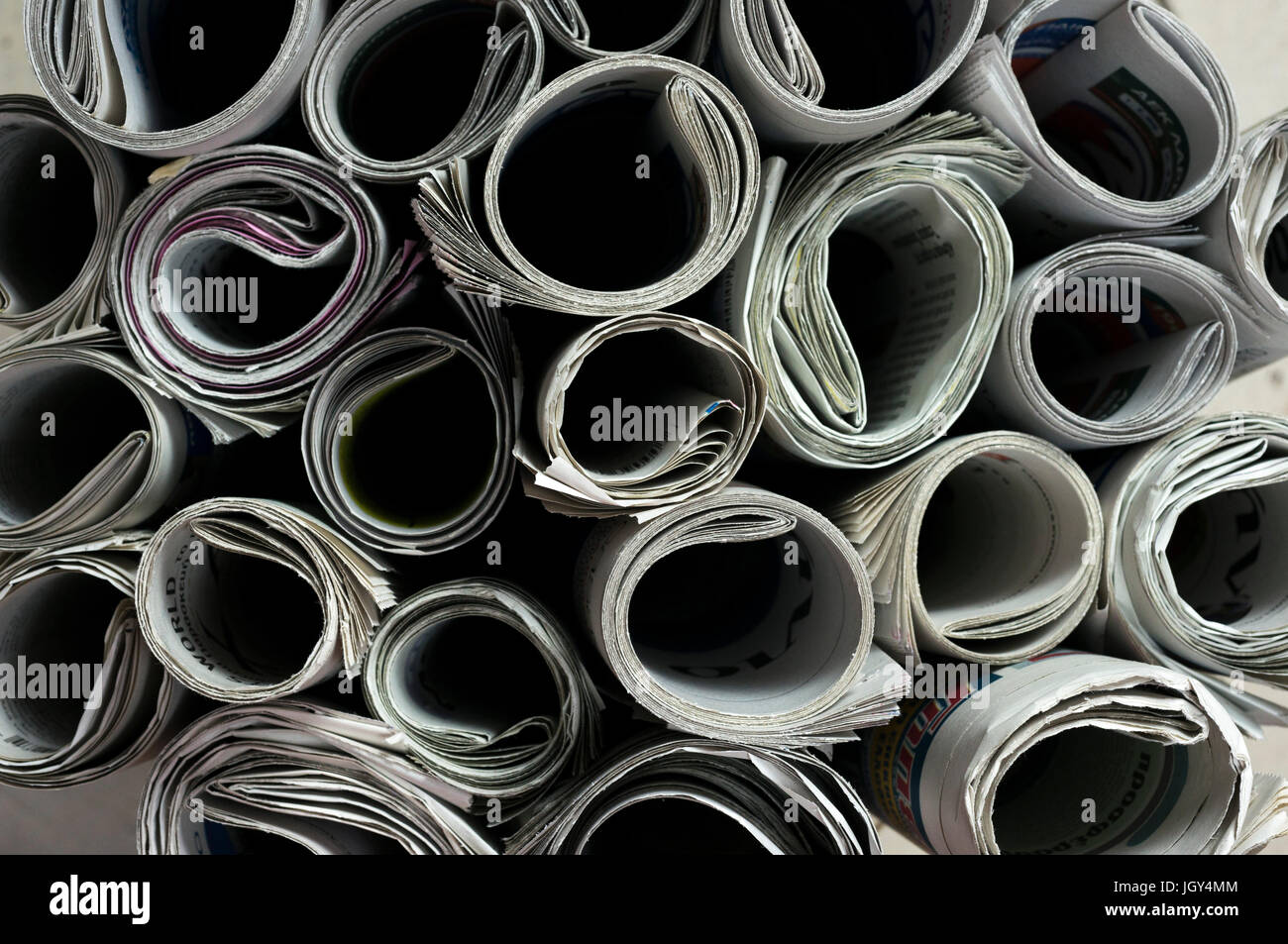 Rolled newspapers hi-res stock photography and images - Alamy